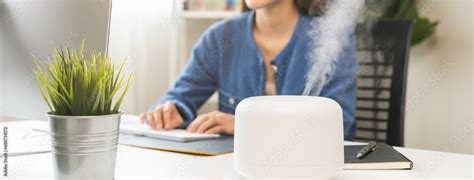 Modern Air Humidifier Device During Sitting Workplace Happy Asian