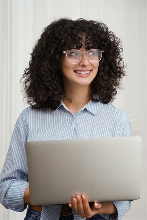 Beautiful Smart Girl Using Laptop Studying For Class Assignment In