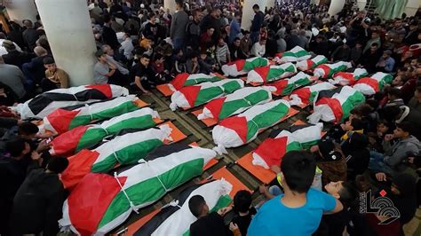 تشييع جثامين 21 مواطناً فلسطينياً قضوا في حريق بمخيم جباليا شمال غزة