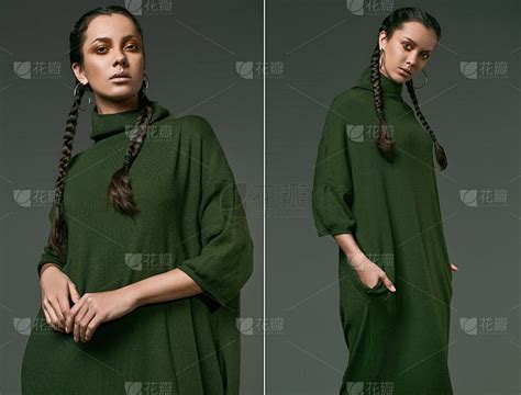 美丽迷人的西班牙女孩穿着绿色长裙