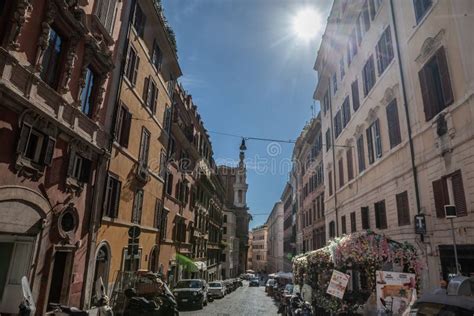 Street In Old Rome Showcases Historic Architecture With Cobblestone