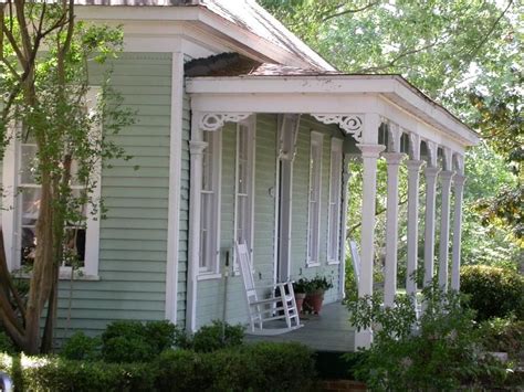 Victorian Cottage Front Porch With White Rocking Chair Victorian