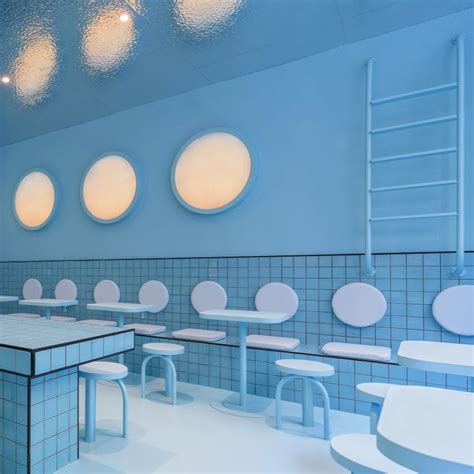 masquespacio uses blocks of colour to break up interior of bun burger joint