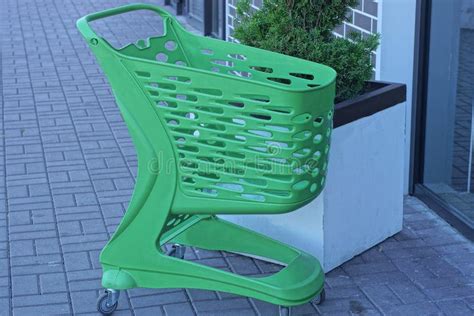 One Green Plastic Empty Grocery Cart Stock Image Image Of Green