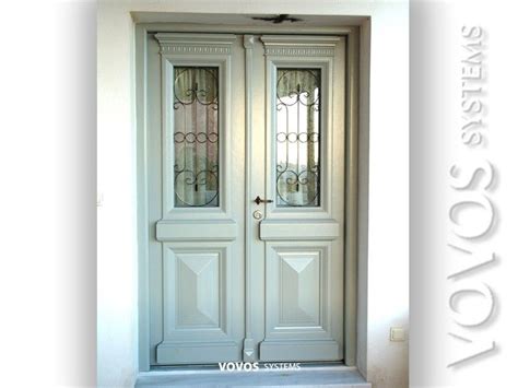 Εξωπορτες Παραδοσιακες Ξυλινες Αρχοντικη Παραδοσιακη ξυλινη πορτα διφυλλη με ανοξειδωτες