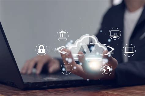 people use laptops with cloud computing to visualize in hand cloud technology data storage