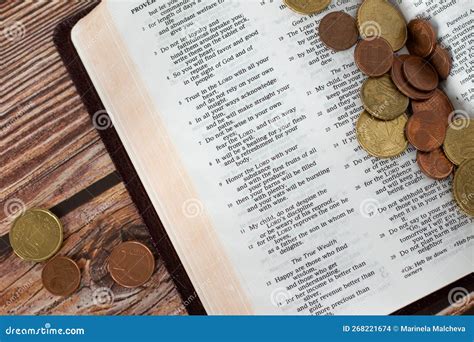 Coin Money On Open Holy Bible Concept Of Christian Tithing Offering