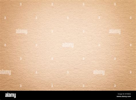 Texture Of Vintage Light Beige Gold Paper Background With Vignette