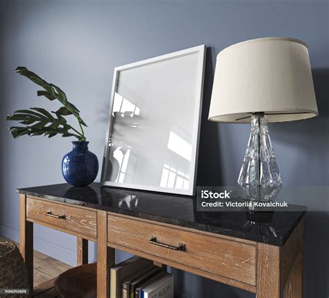 모형 프레임은 거실 내부 배경에서 닫힙니다 장식 테이블 램프 식물 및 책 장식 농가 인테리어입니다 3d 렌더링 고품질 3d 그림 복고풍에 대한 스톡 사진 및 기타 이미지