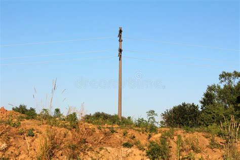 Concrete Electrical Power Line Utility Pole With Multiple Ceramic Insulators Connecting And