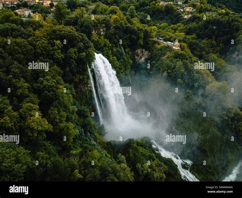 Aerial View Of The Breathtaking Marmore Falls Surrounded By Lush