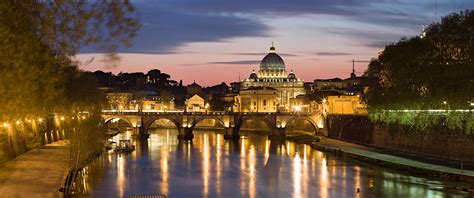 Photothèque Arnaud Frich Pont Saint Ange et basilique Saint Pierre de Rome au crépuscule