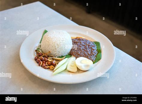 Nasi Lemak A Malay Style Meal Of Fragrant Rice Cooked In Coconut Milk