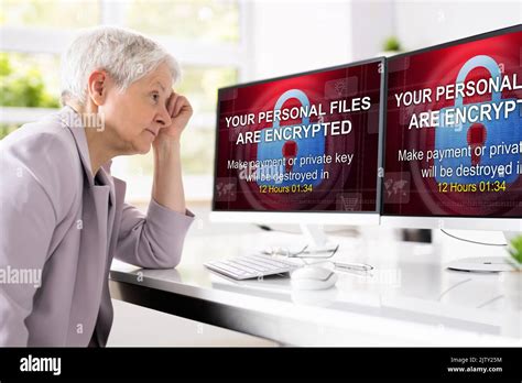 Ransomware Cyber Attack Showing Personal Files Encrypted Screen Stock