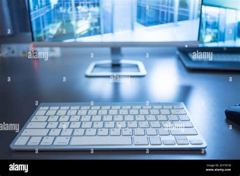 Freelancers Workplace Keyboard In The Foreground Blurry Screen In