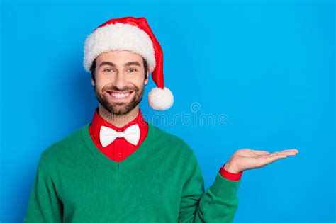 Photo Of Positive Nice Person Toothy Smile Hand Palm Hold Demonstrate