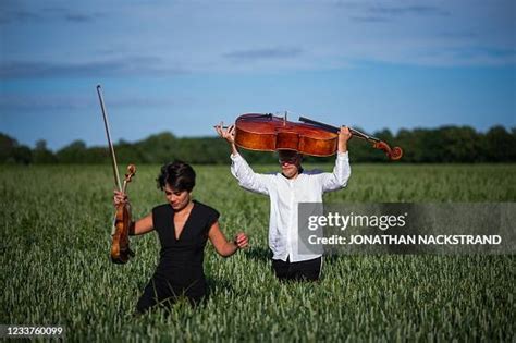 Cellist Jacob Shaw And Violinist Roberta Verna Are Pictured On A Corn News Photo Getty Images