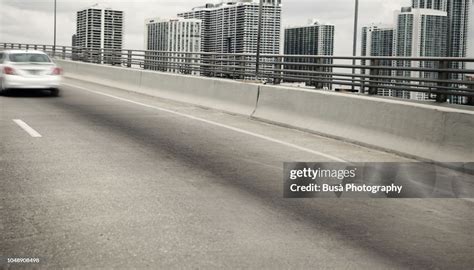 Car Driving On Julia Tuttle Causeway Connecting Midtown Miami With