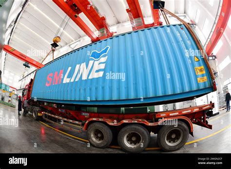 HAIAN CHINA FEBRUARY 6 2024 Workers Load 25 Energy Saving