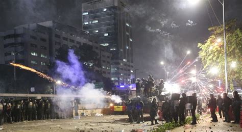 Indonesia Protests Police Fire Tear Gas As Demonstraters Oppose