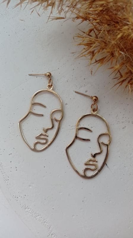 Сережки силует обличчя біжутерія — ціна 70 грн у каталозі Сережки Купити аксесуари за доступною