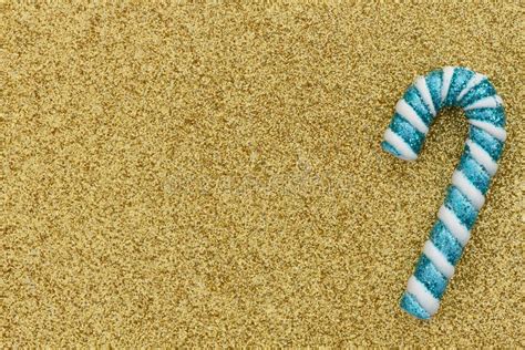 Teal And White Candy Cane On Gold Glitter Holiday Background Stock