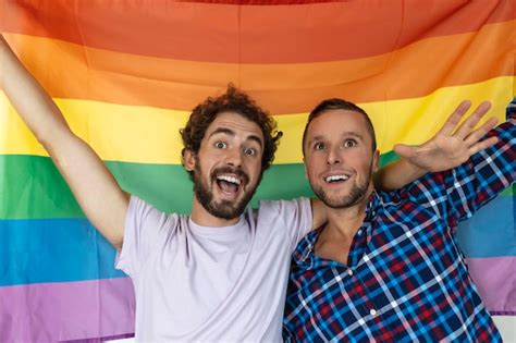 Premium Photo Two Young Gay Lovers Looking At Each Other Affectionately Two Young Male Lovers