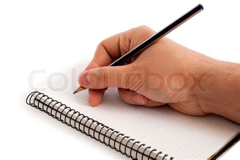 Hand With Pencil Writes In Notebook Stock Image Colourbox