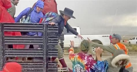 Burning Man Revelers Begin Exodus After Thousands Stranded