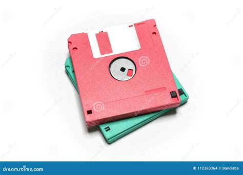 old colored computer floppy disks isolated on white background stock