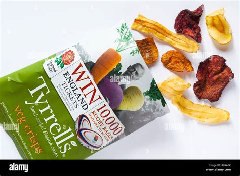 Opened Packet Of Tyrrells Veg Crisps Hand Cooked English Crisps
