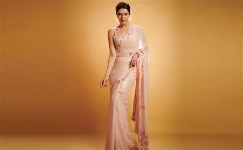 Karishma Tanna Raises Mercury In Hot Blouse And Matching Saree L Photos