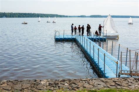 A Floating Pier On The Lake On Which Float Editorial Photography