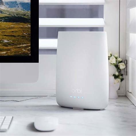 Netgear Orbi Tri Band Home Mesh WiFi System With Built In Cable Modem