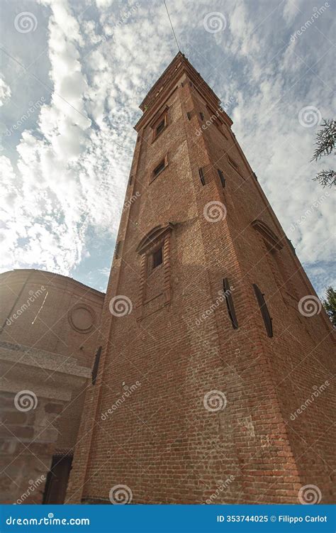 Medieval Brick Tower Reaching For The Cloudy Sky In Ferrara Italy