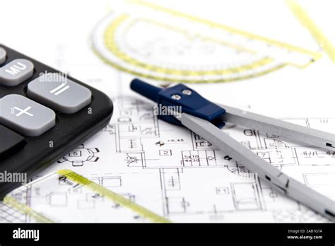 Photo Of The Architectural Project Pair Of Compasses Rulers And