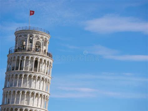 Leaning Tower Of Pisa With Pisa City Flag On The Top Of It Close Up At