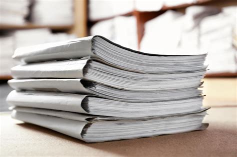 Premium Photo Stack Of Cardboard Folders With Documents In Archive