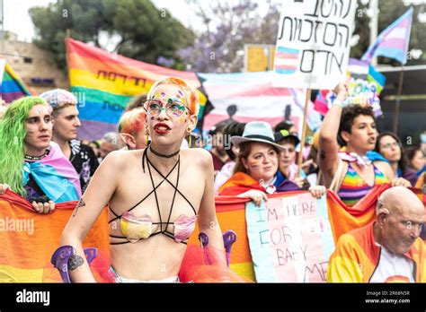 Participants Seen With Rainbow Flags Placards And Banners As They