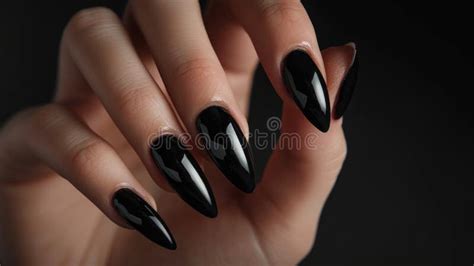 Photos Of The Design Of Black Nails On The Hands Advertising The Color