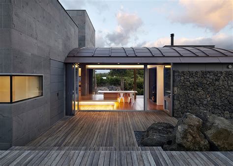 Stone Residence By Doojin Hwang Stands Among Citrus Trees