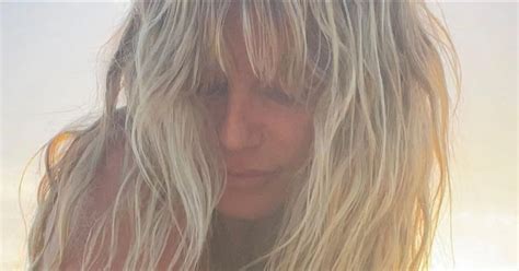 Heidi Klum Pulls Out Her Best Supermodel Moves As She Poses For Beach
