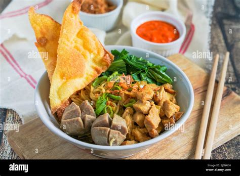 Indonesian Street Food Mie Ayam Bakso Noodles With Chicken And Served