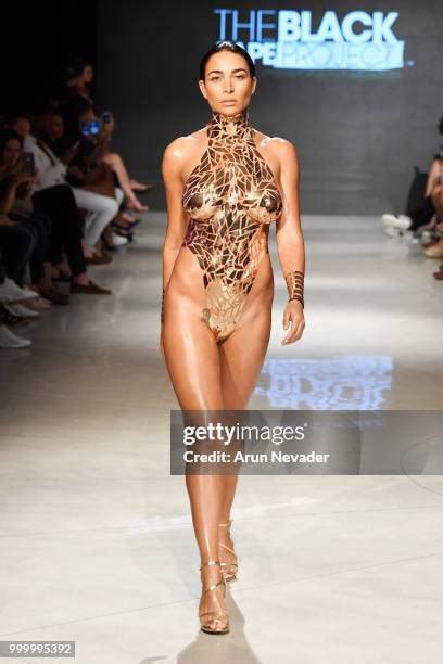 A Model Walks The Runway For Black Tape Project At Miami Swim Week