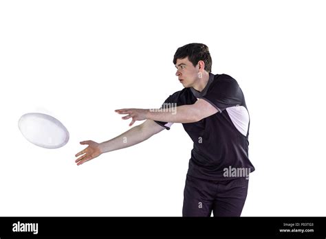 Rugby Player Doing A Side Pass Stock Photo Alamy