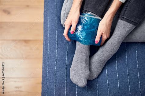 Woman With Spasm Cramp Sprained Dislocated Ankle Ruptured Tendon