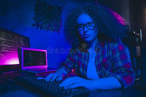 Young Female Programmer In A Creative Home Office Immersed In Coding At