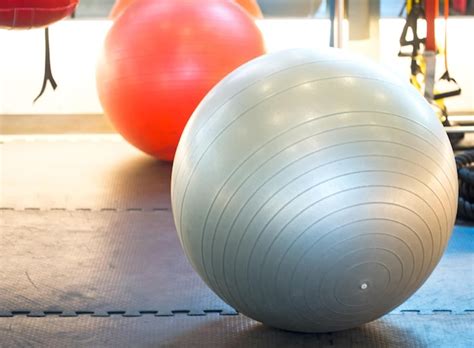 Premium Photo Close Up Of Fitness Balls In Gym