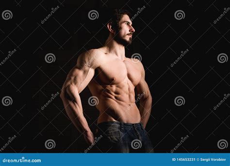 Portrait Of Shirtless Muscular Man In A Jeans Young Male Hunk Showing