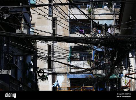 Cable Wires On The Electric Poles Are Tangledmessy Signal Line For